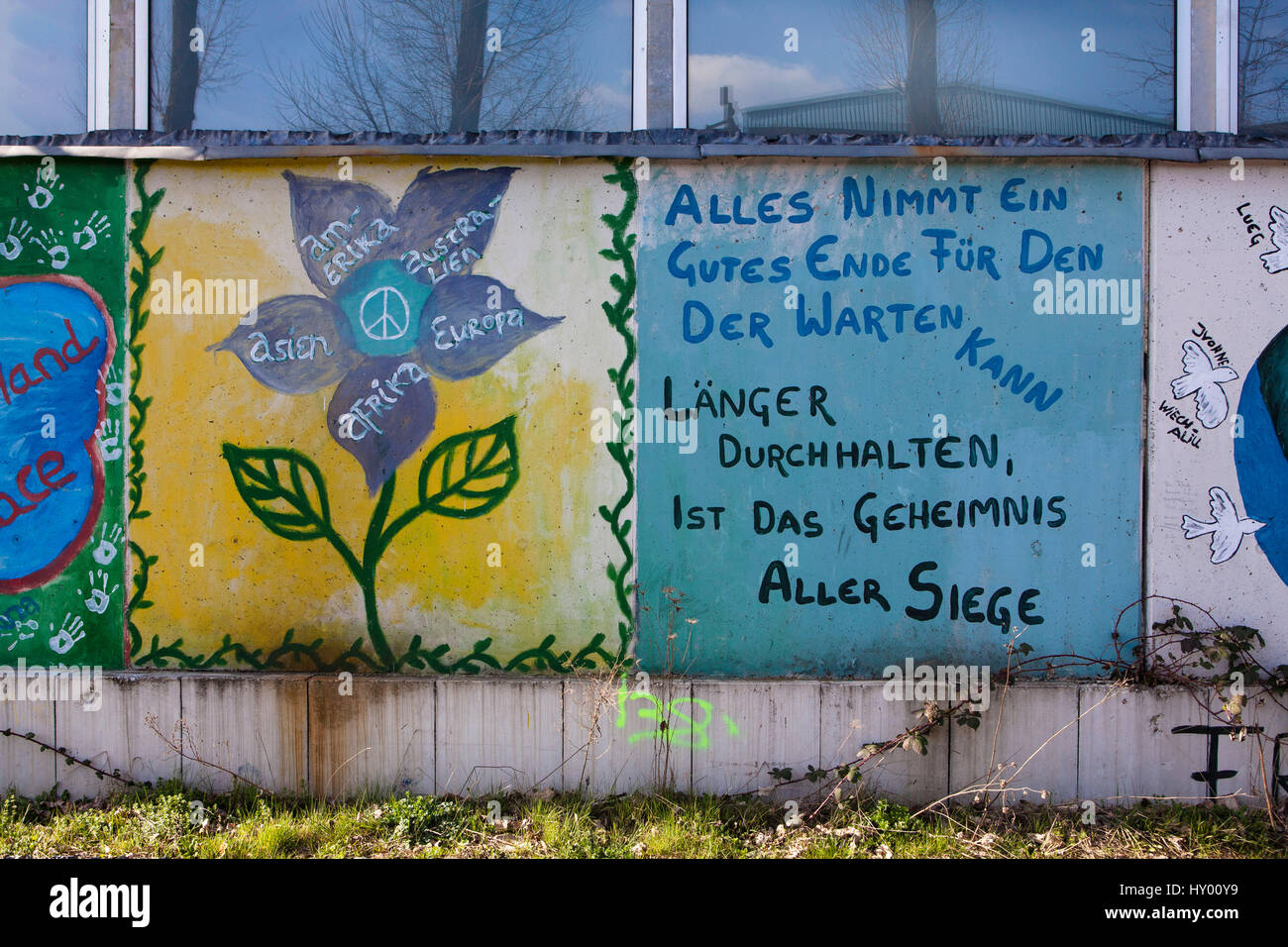 Europe, Germany, Cologne, graffiti on a wall in the harbor Muelheim ...