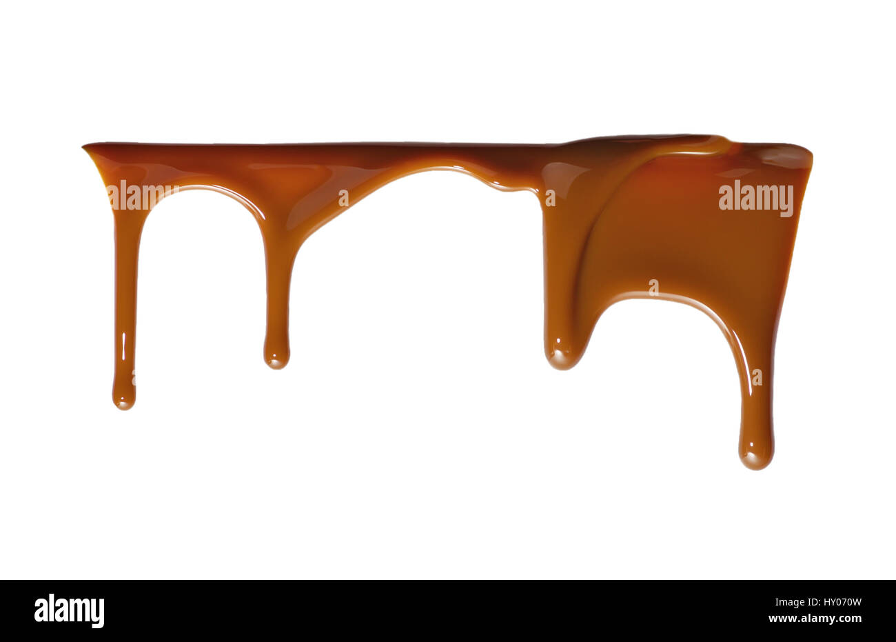 Liquid chocolate flowing downwards isolated on white background Stock ...