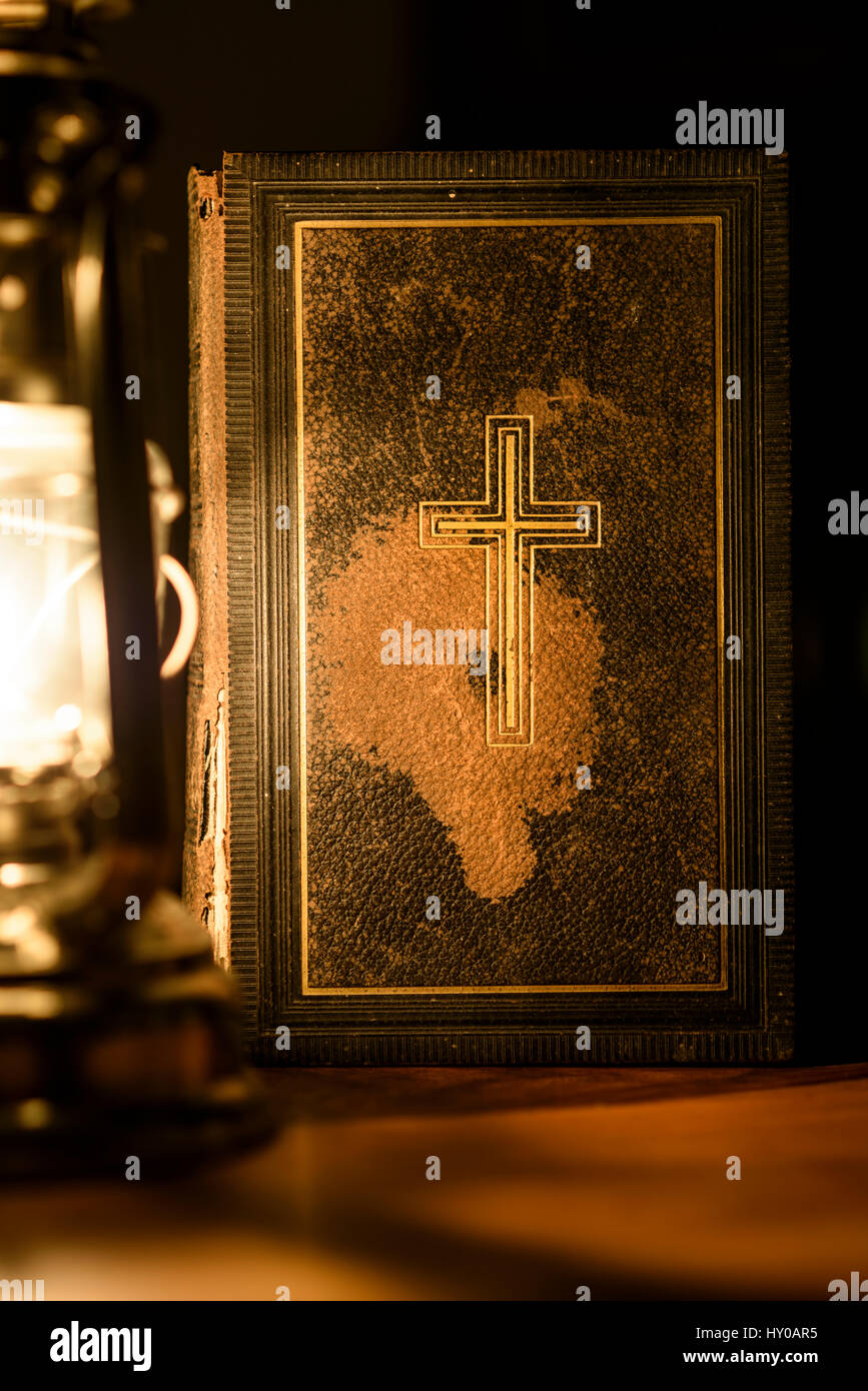 Illuminated bible with cross hi-res stock photography and images - Alamy