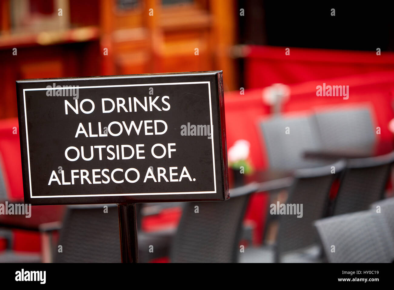 Sign stating no drinks are allowed outside the seating area Stock Photo ...