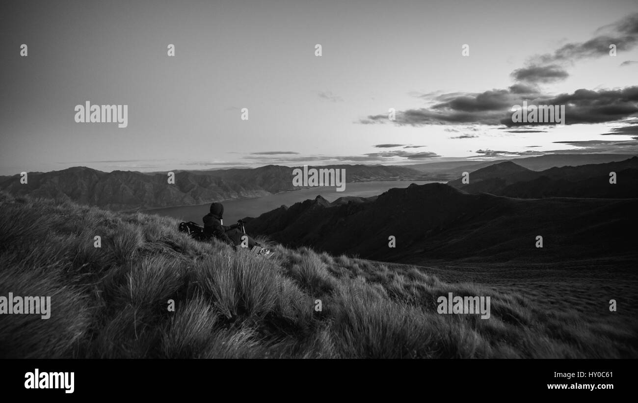 Watching / photographing the sunset from up high Stock Photo - Alamy