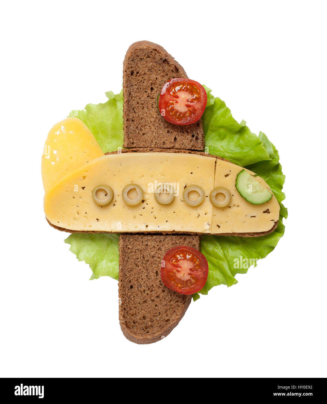 Plane made of bread and cheese on white background Stock Photo - Alamy