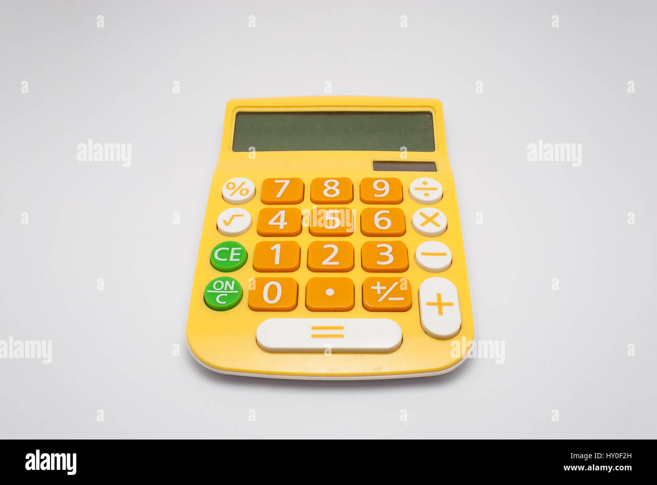 Bright Yellow Calculator with Solar Cell, Isolated Stock Photo - Alamy