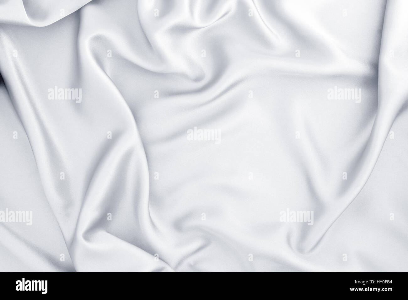 Close up wave white silk or satin fabric background Stock Photo - Alamy