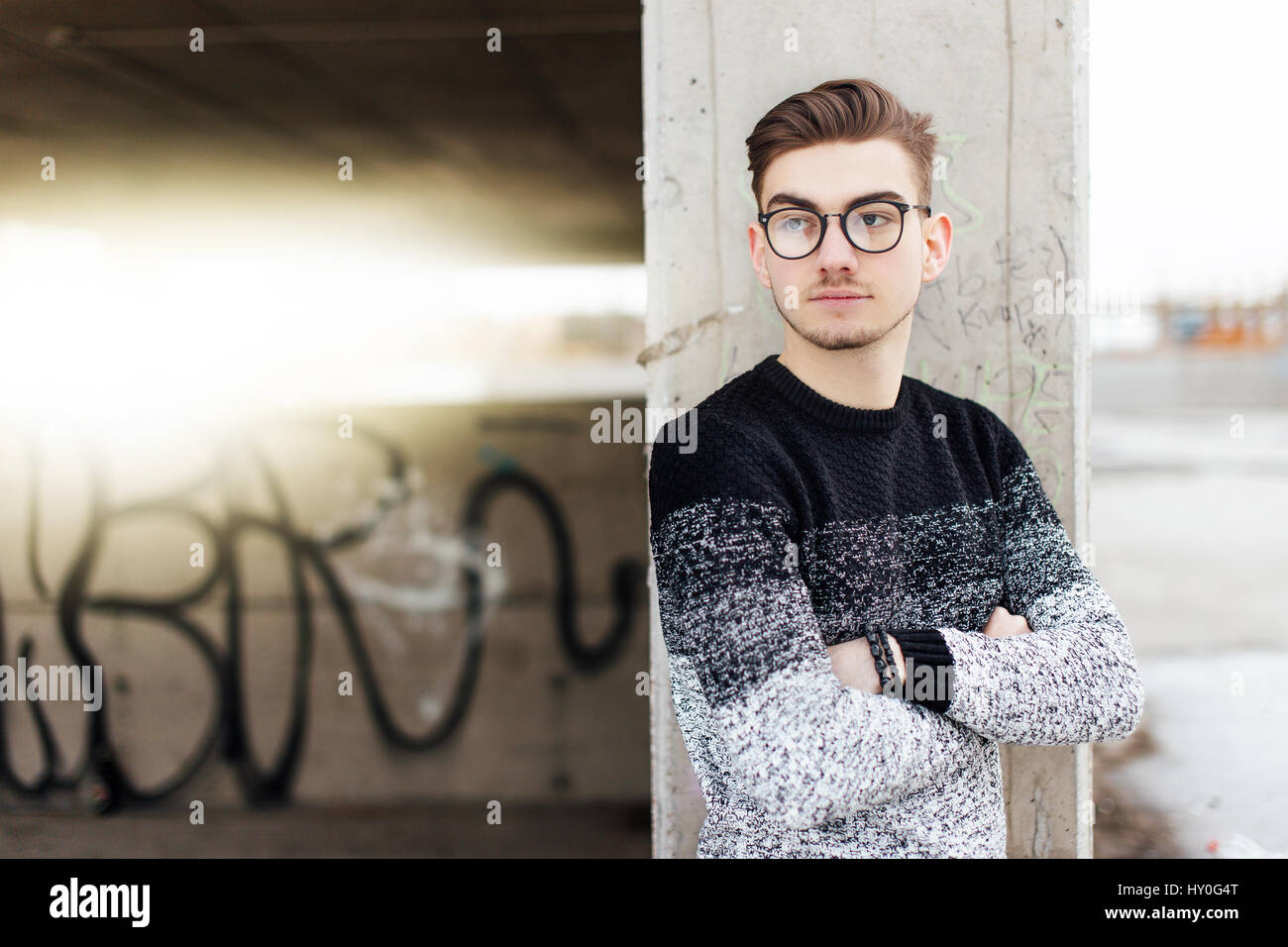 Male model sitting wall hi-res stock photography and images - Alamy