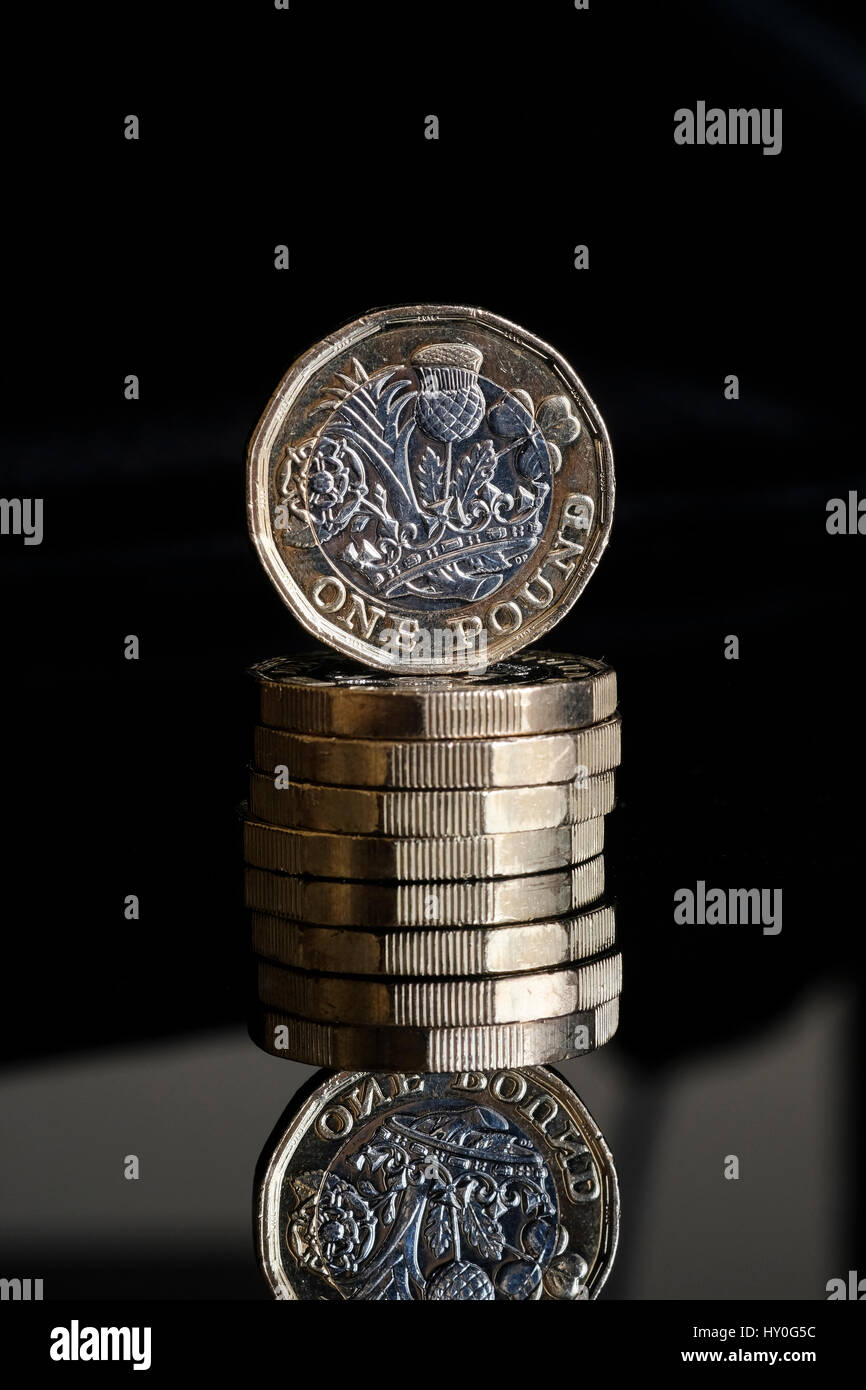 2017 new pound coins against black background Stock Photo - Alamy