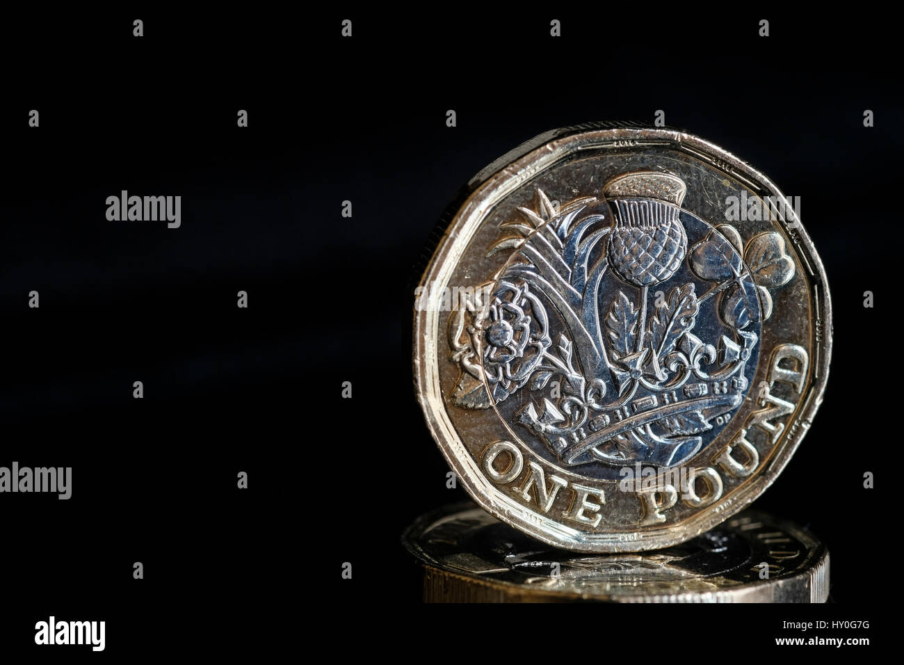 2017 new pound coins against black background Stock Photo - Alamy