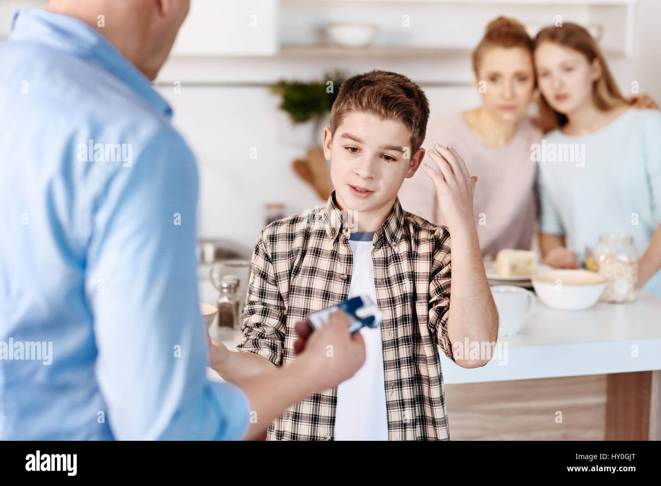 It is a mistake. Little boy making excuses and talking with serious ...