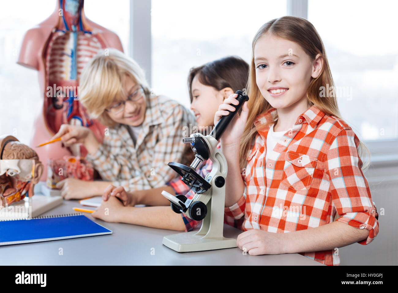 Bright little scientists enjoying research work Stock Photo - Alamy