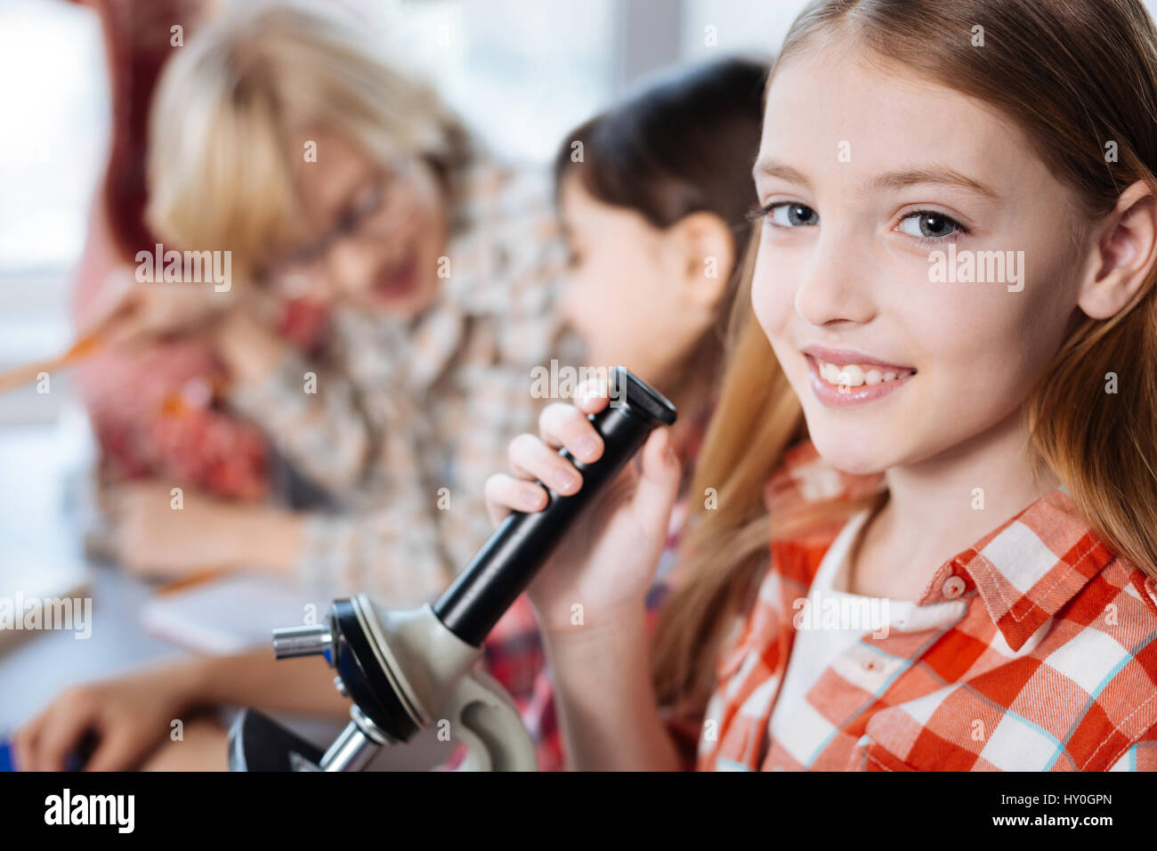 Productive cute kids working on science project Stock Photo - Alamy
