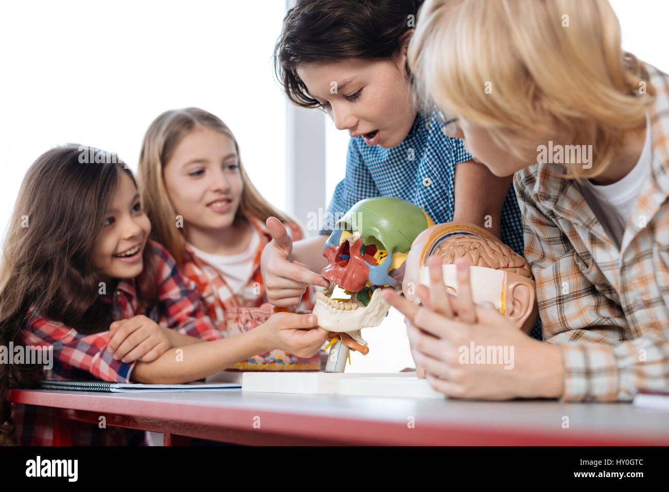 Lovely talkative kid explaining something about teeth Stock Photo - Alamy