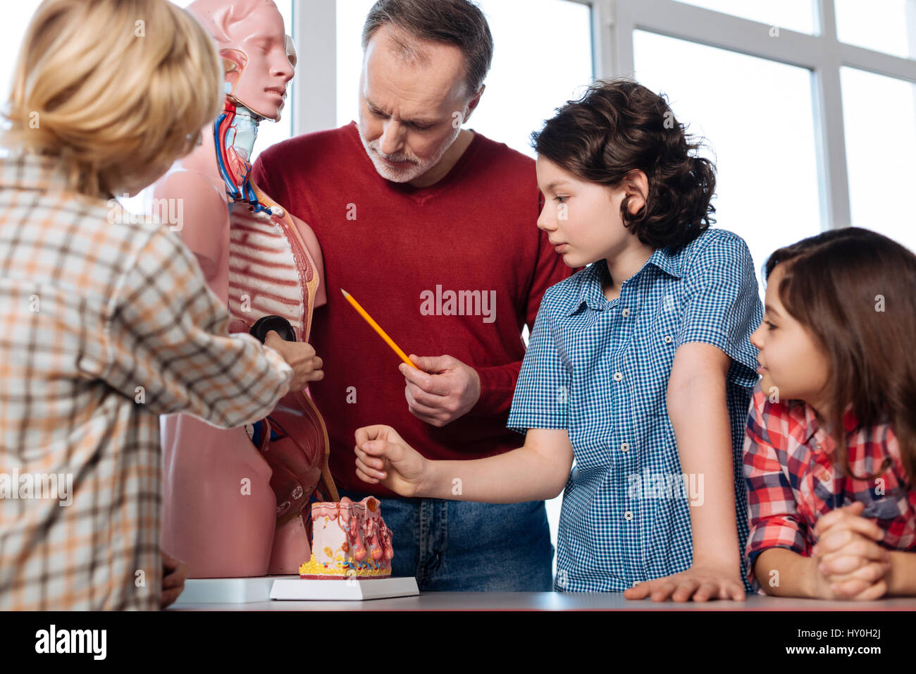 Enthusiastic engaging teacher giving a lecture Stock Photo - Alamy