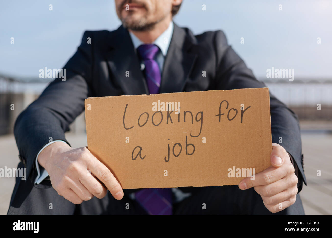 Close up of young man that looking for a job Stock Photo - Alamy