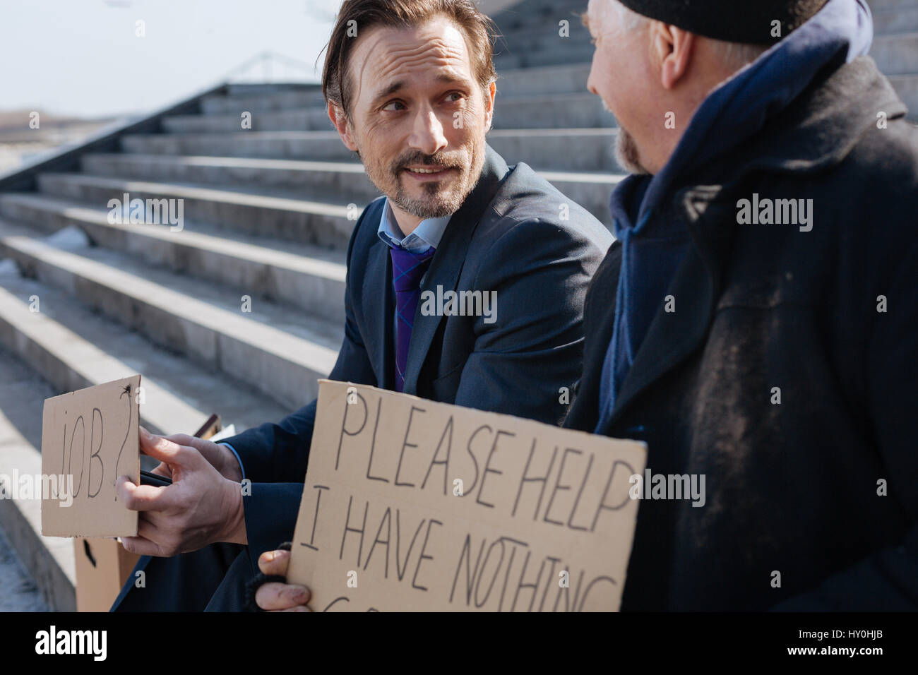 Handsome office worker looking for a job Stock Photo - Alamy