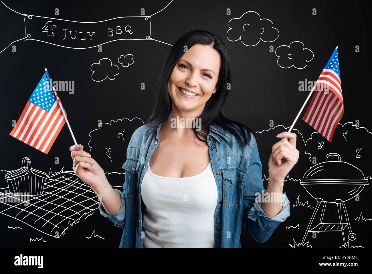 Happy patriotic woman celebrating 4th July Stock Photo - Alamy