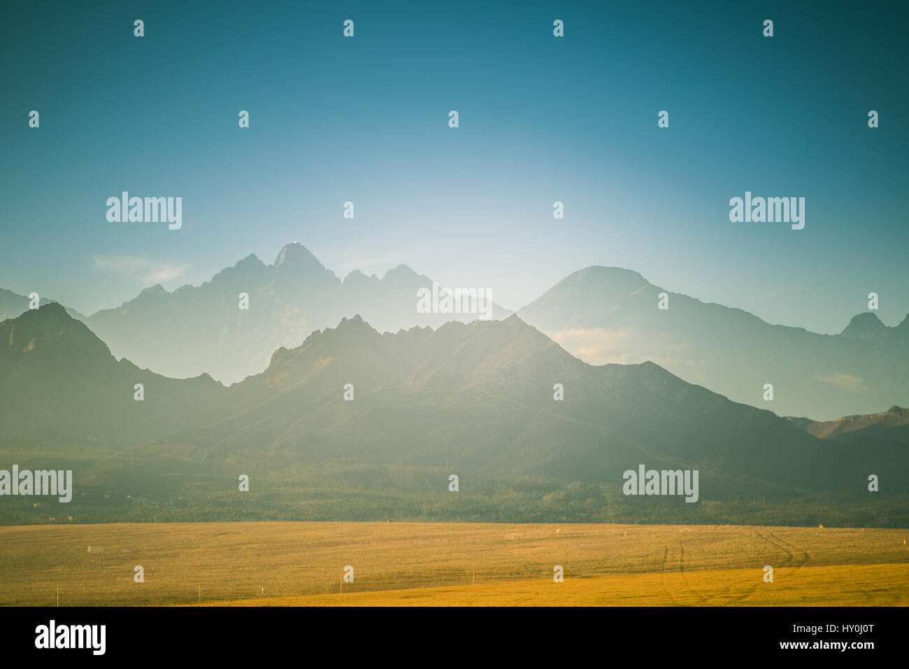 A beautiful, colorful, abstract mountain landscape with a hot summer ...