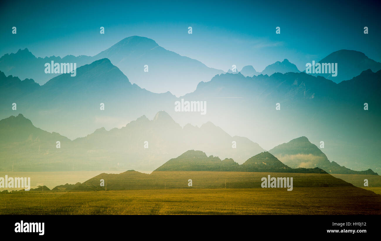 A beautiful, colorful, abstract mountain landscape with a hot summer ...