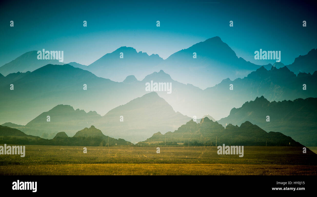 A beautiful, colorful, abstract mountain landscape with a hot summer ...