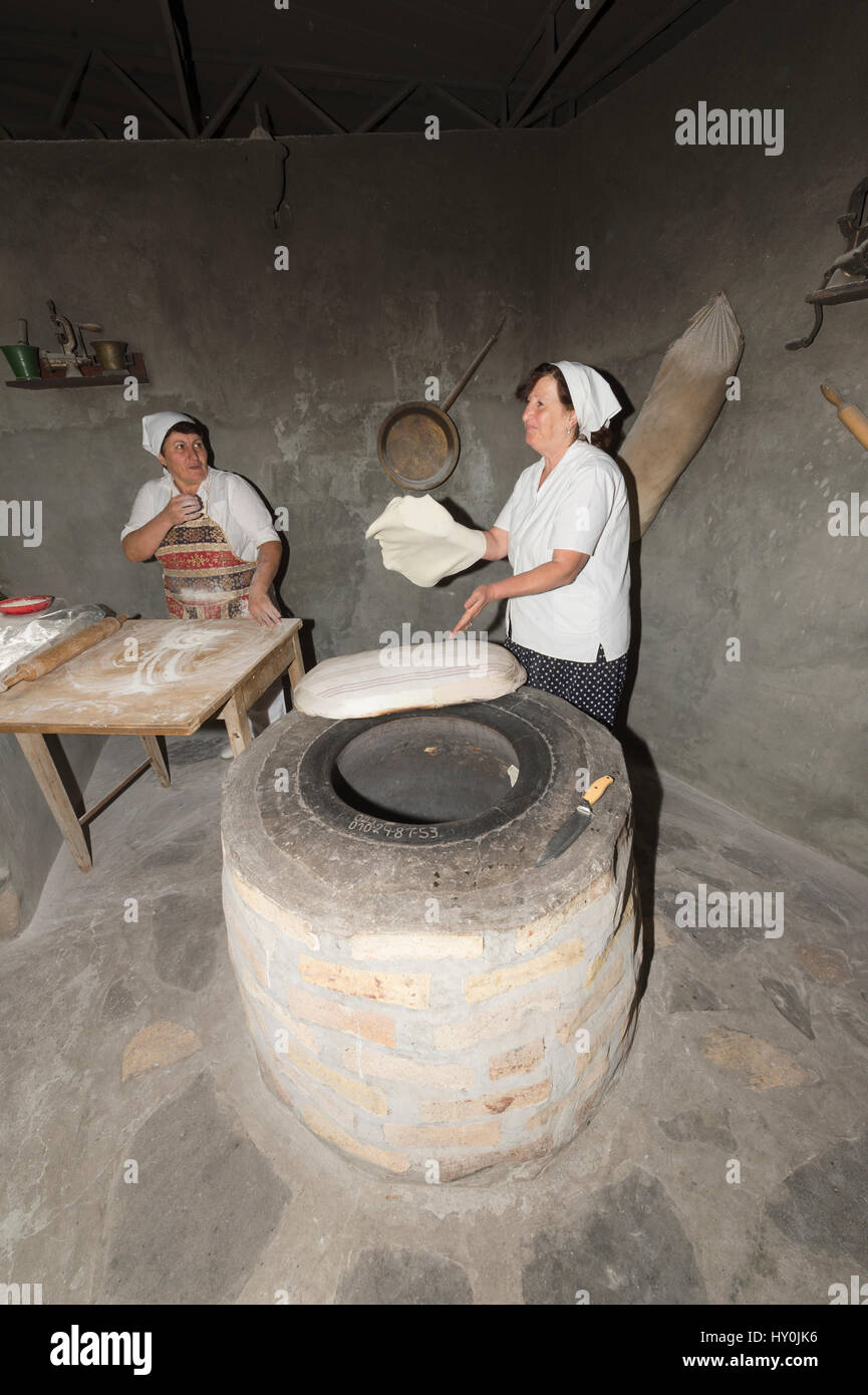 Georgian women preparing the traditional local tandyr bread, Yerevan ...