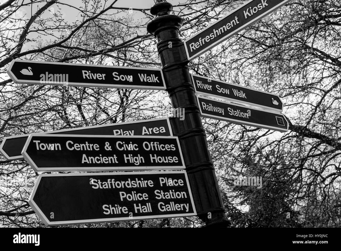 Sign signpost directions trees Black and White Stock Photos & Images ...