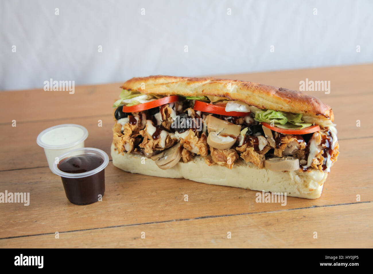 Fried Chicken foot long sub sandwich Stock Photo - Alamy