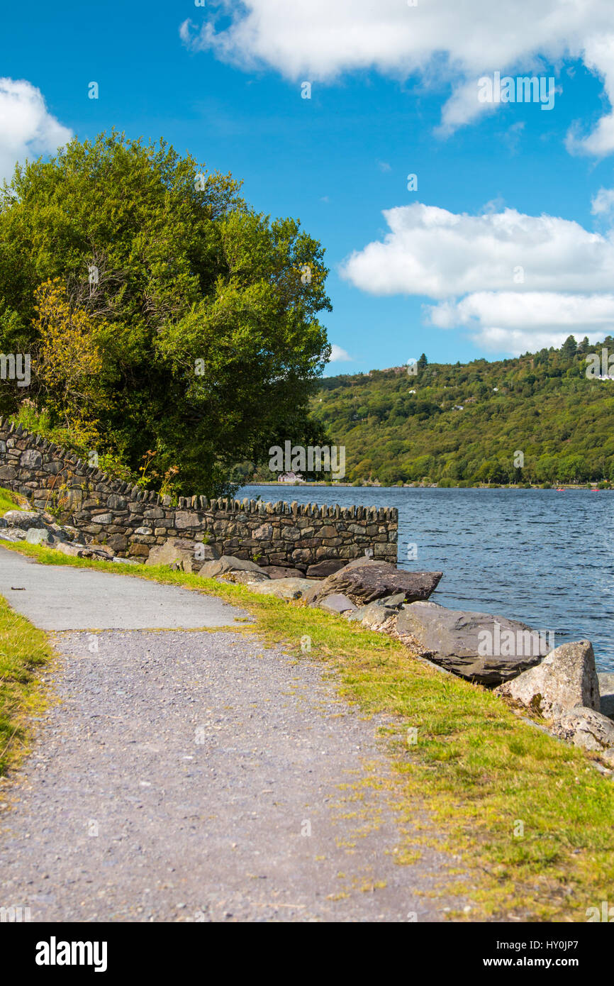 The view from the lakeside footpath running along the shore of Llyn ...