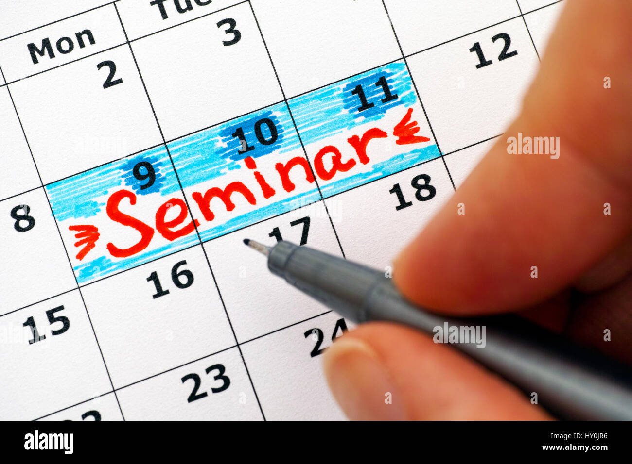 Woman writing on calendar hi-res stock photography and images - Alamy