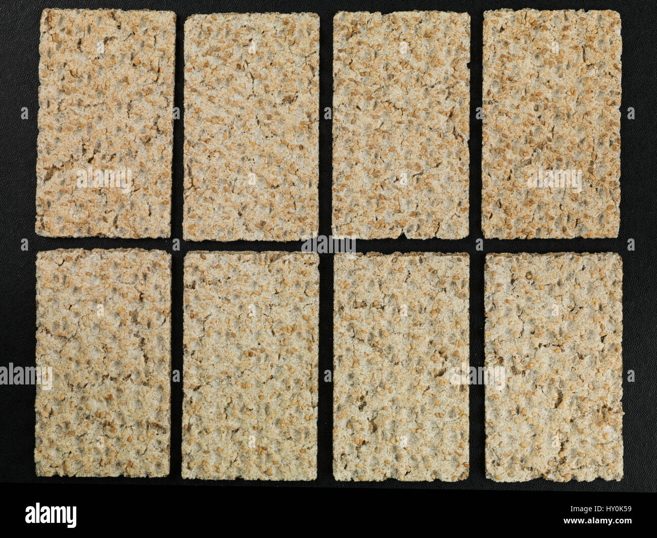 Crispy Dry Rye Crackers On A Black Background Stock Photo - Alamy