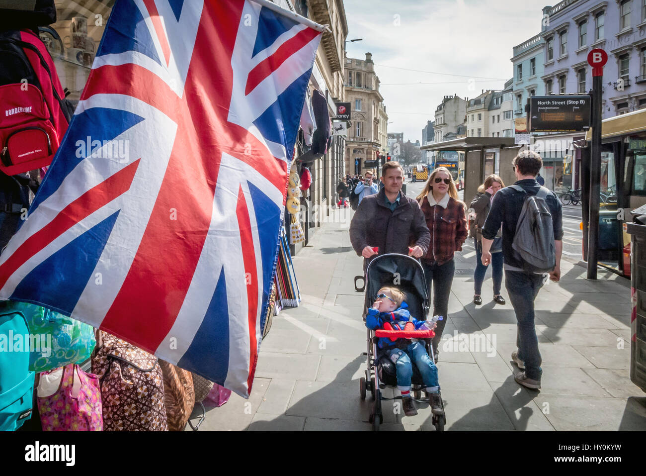 The Union flag still flying in a British High Street Stock Photo - Alamy