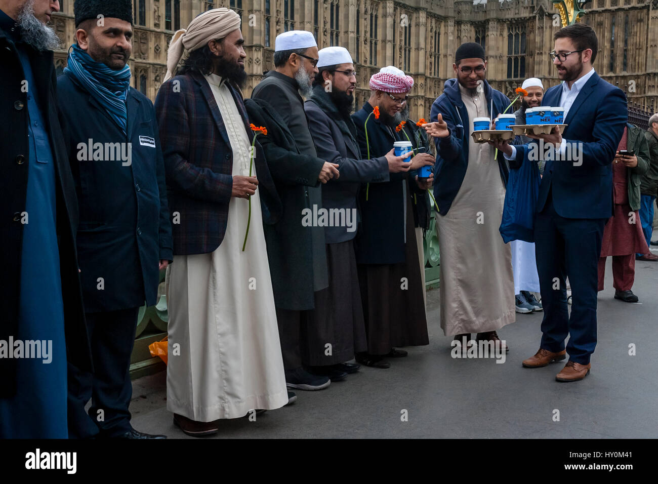 A Man Gives Cups Of Coffee To Some Of London's Muslims Who Had Gathered ...