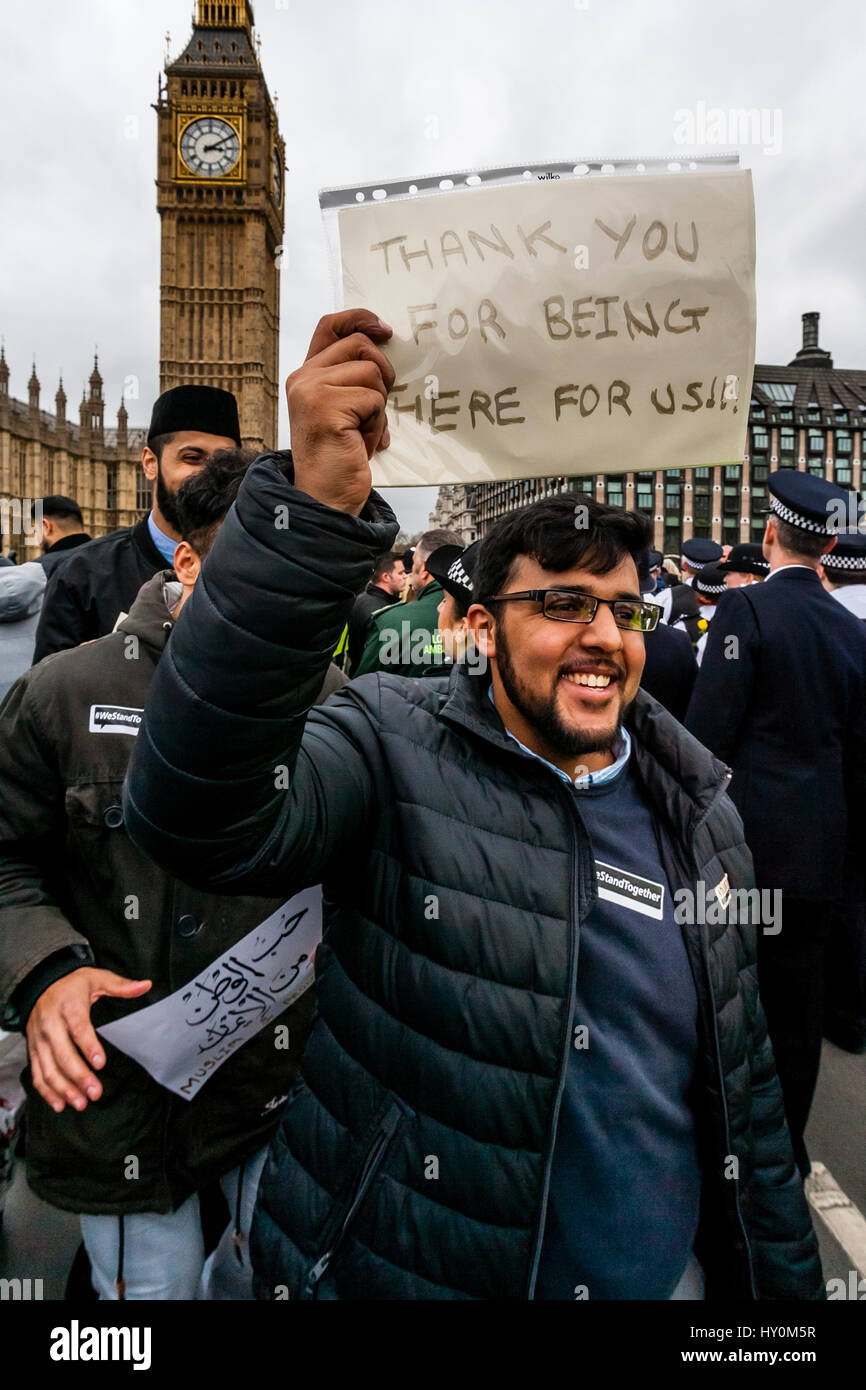 Young British Muslims Hold Up Signs Supporting The Police After The ...