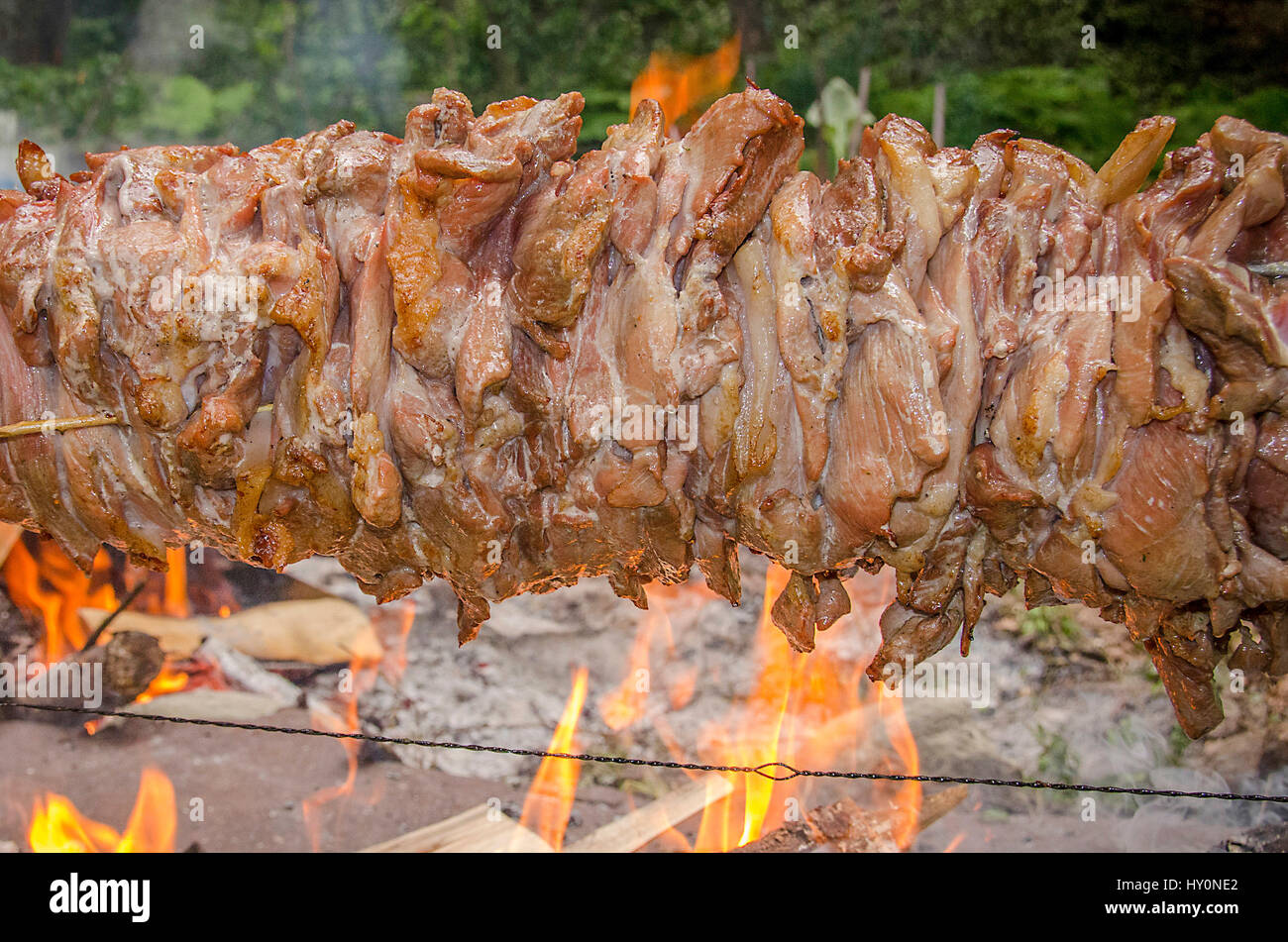 Roasting meat on Fire Stock Photo - Alamy