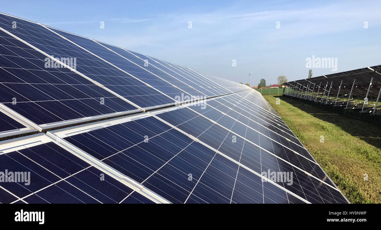 aerial view of a solar farm - a field of solar panels in the north of ...