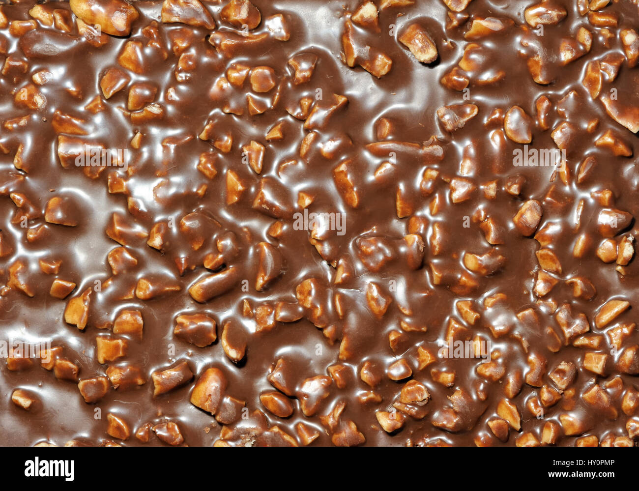 Texture of the chocolate with nuts Stock Photo - Alamy