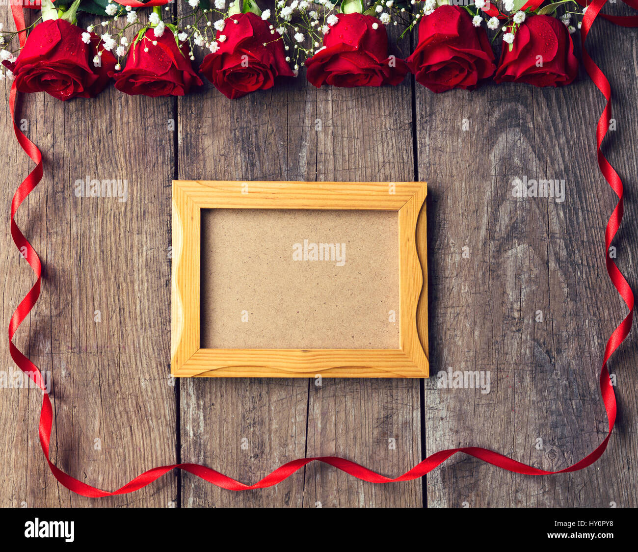 frame for copy space with beautiful red roses background Stock Photo ...