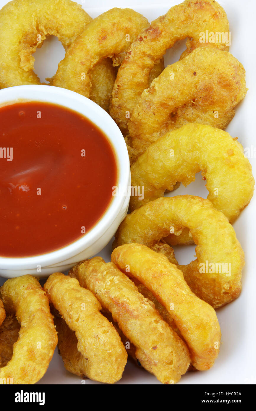 Fried breaded calamari with sauce Stock Photo - Alamy