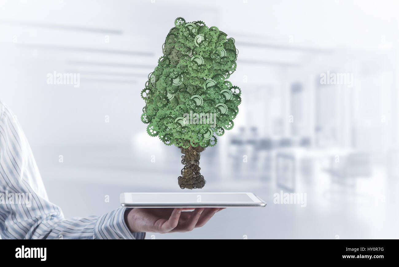 Eco green environment concept presented by tree as working mecha Stock ...