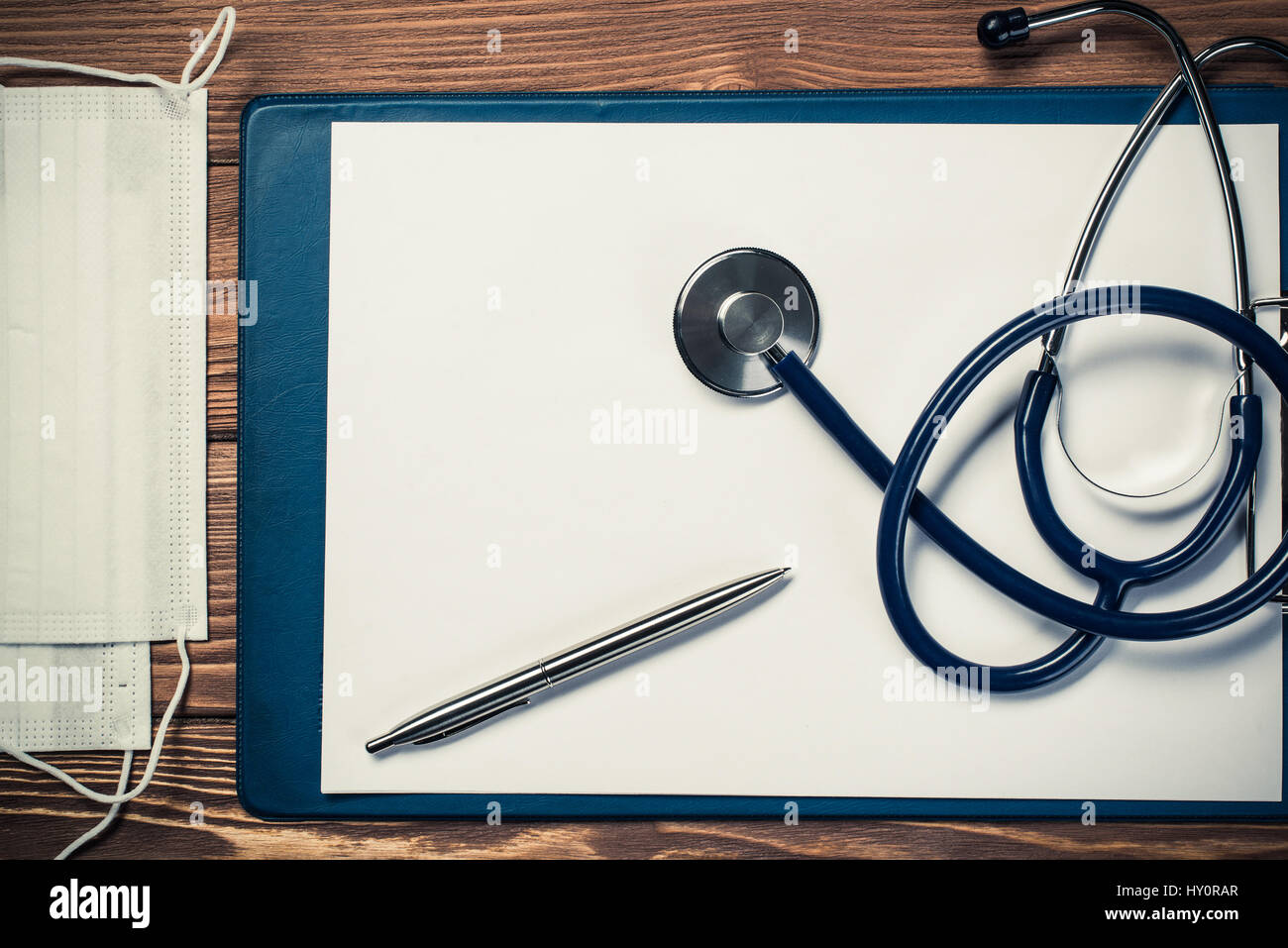 Desk of doctor with medicine things Stock Photo - Alamy
