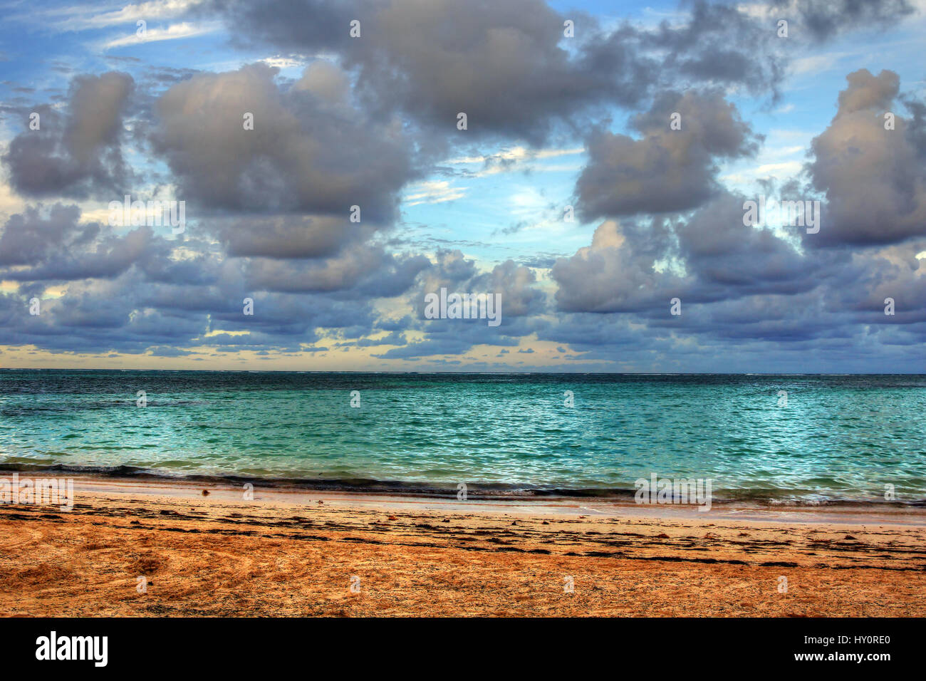 Sun setting on tropical sea, HDR Stock Photo - Alamy