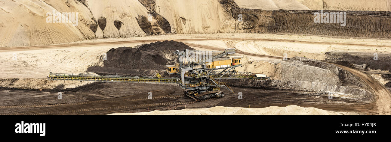 Bucket wheel excavator in a open pit coal mine. Coal mining in Cottbus ...