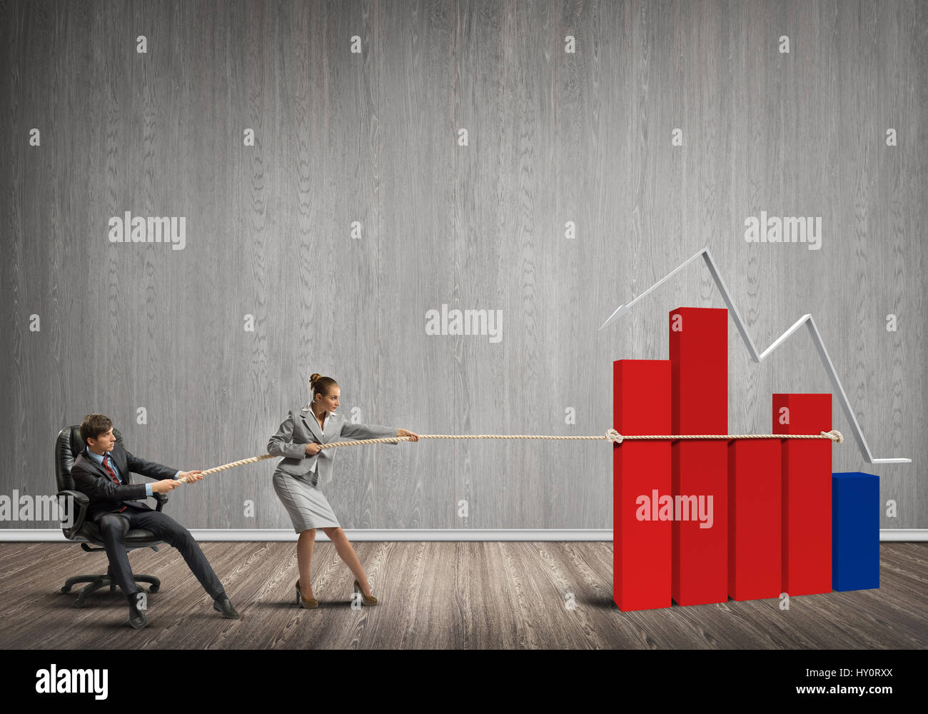 Businesspeople pulling with effort graph growth as a symbol of ...