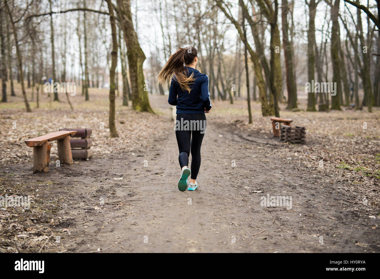healthy lifestyle fitness sporty woman runner running in forest trail ...