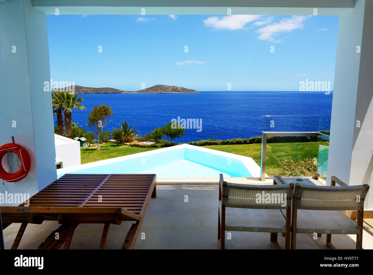 Swimming pool at luxury hotel with a sea view, Crete, Greece Stock ...