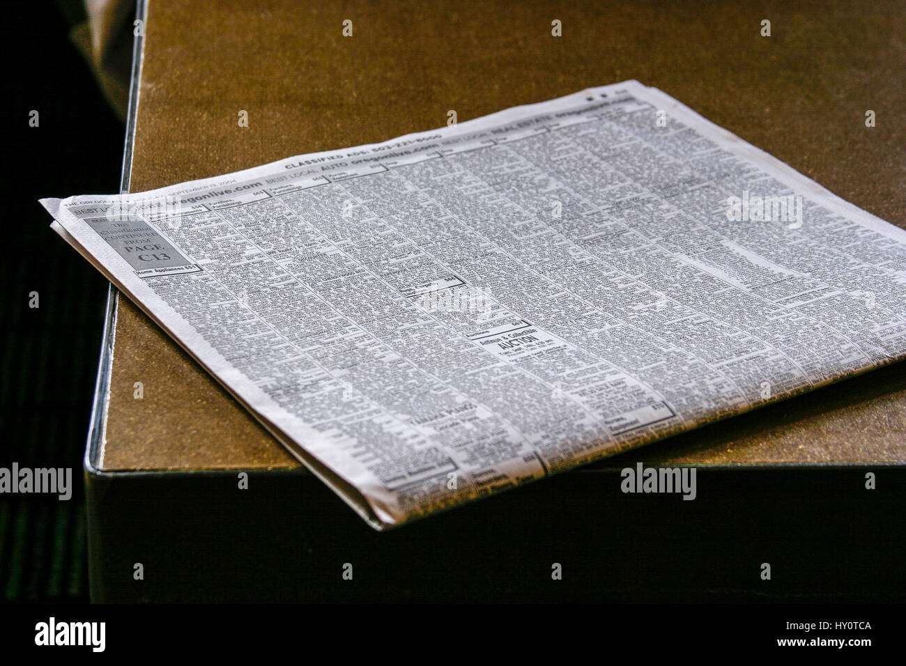 Open Newspaper On Table