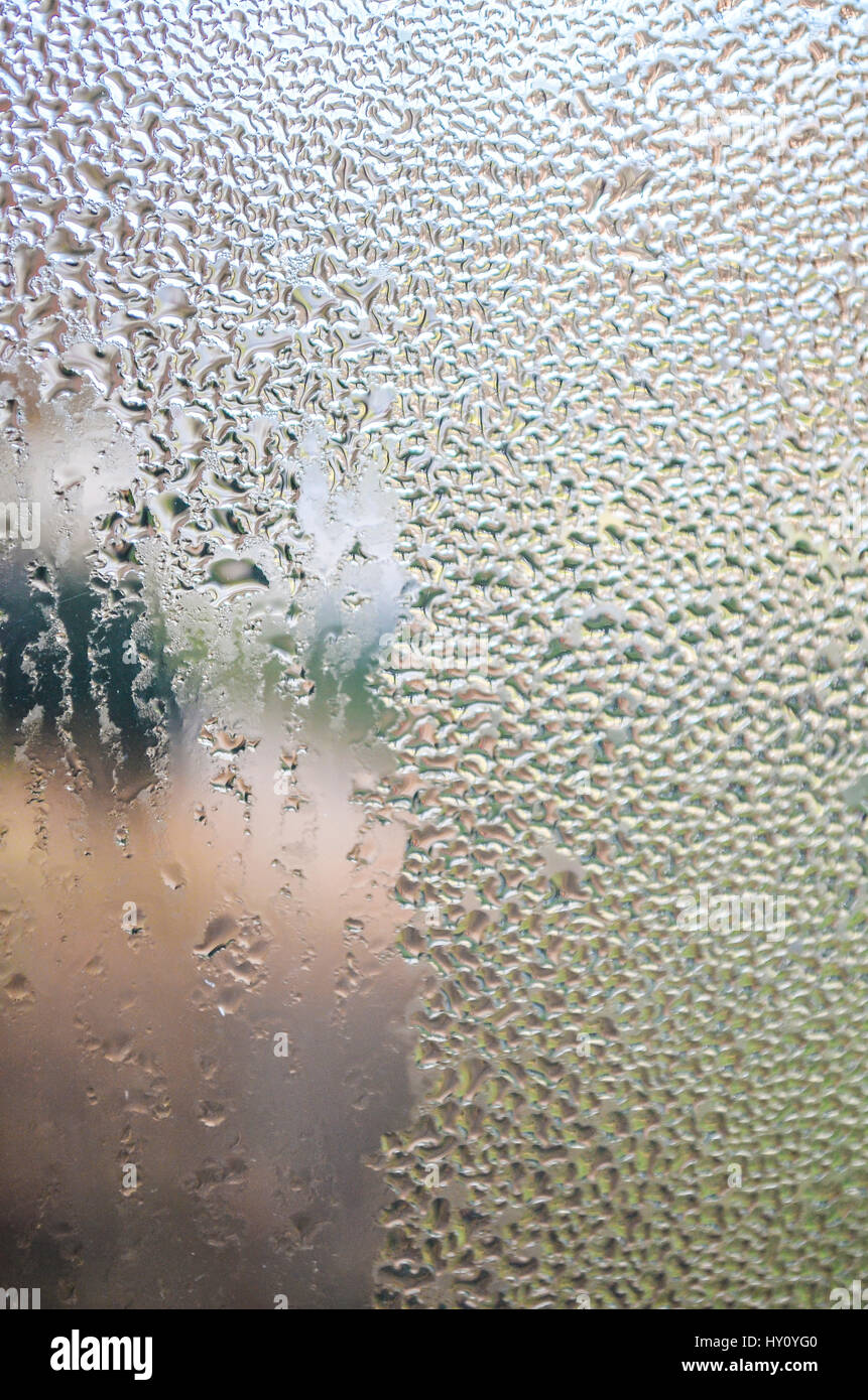 Rain water droplets on window macro closeup Stock Photo - Alamy
