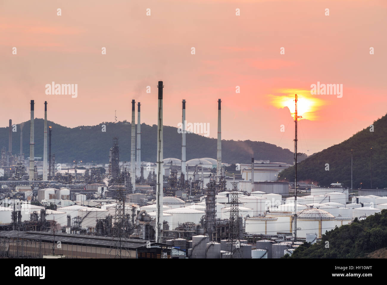 Oil refinery at sunset Stock Photo - Alamy
