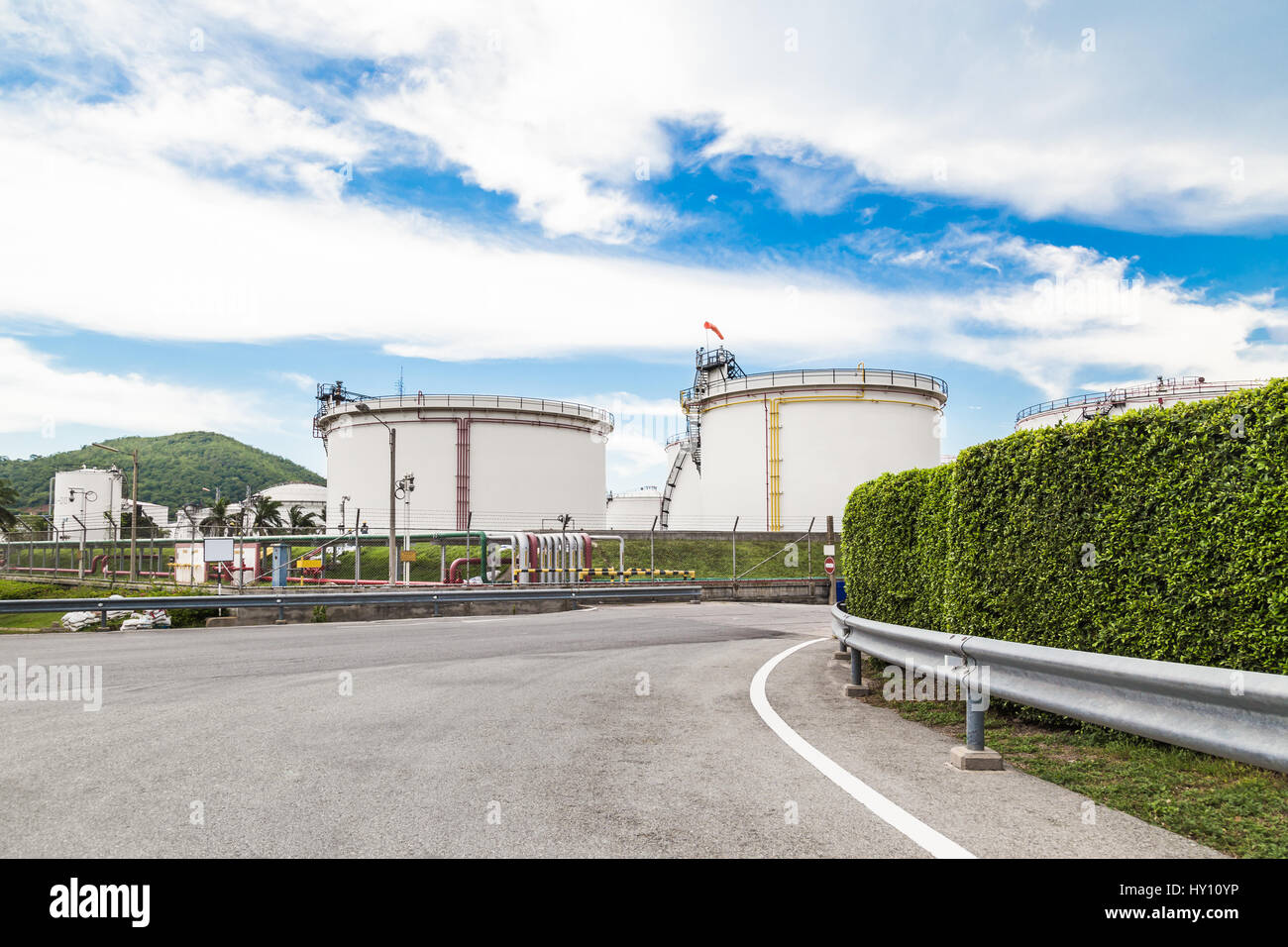 Oil tanks with blue sky Stock Photo - Alamy