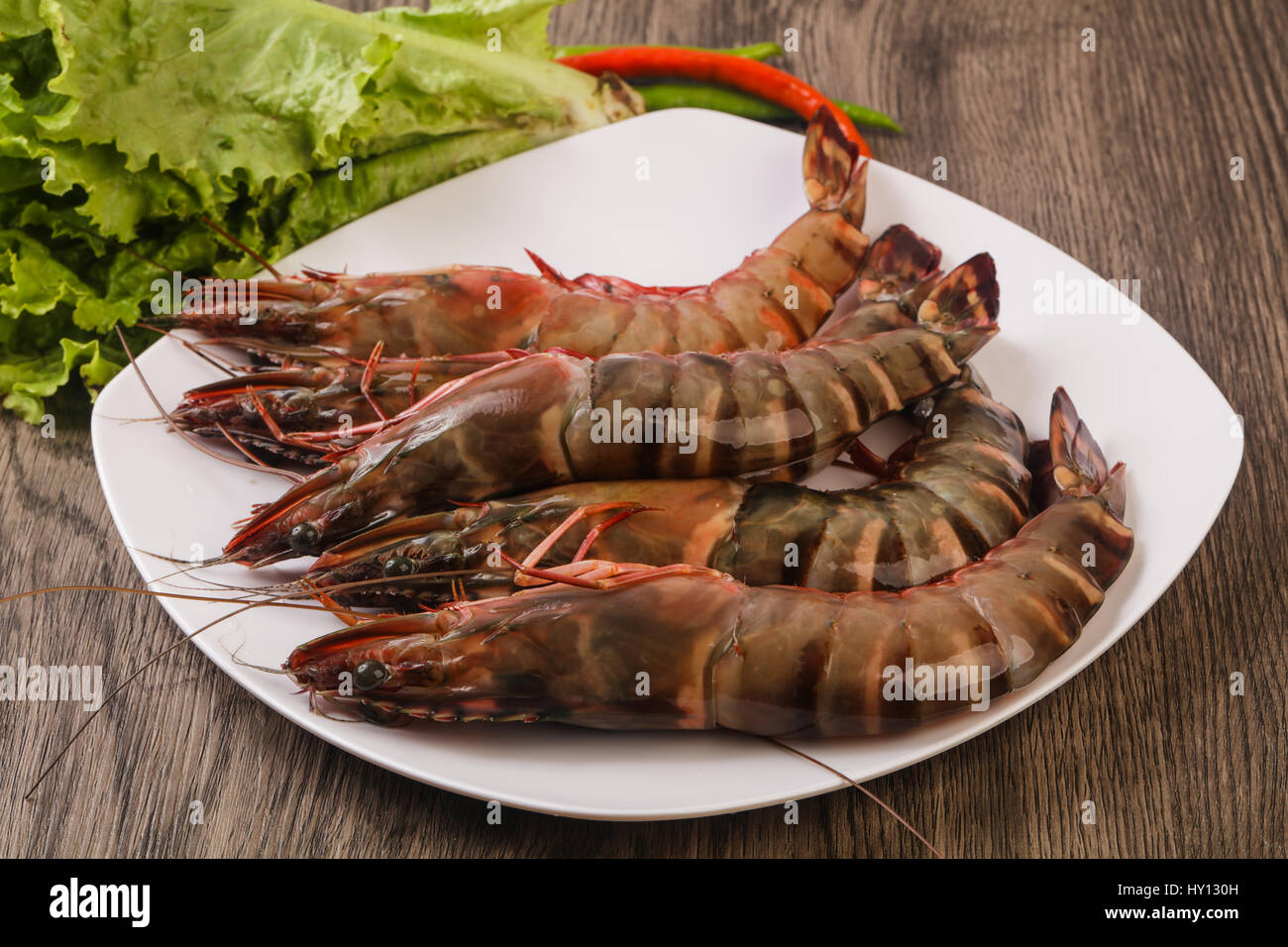 Raw big tiger prawn - ready for cooking Stock Photo - Alamy