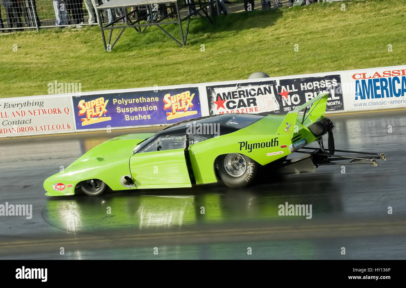 Santa Pod, UK - October 29, 2011: Sleek Plymouth funny car dragster on ...