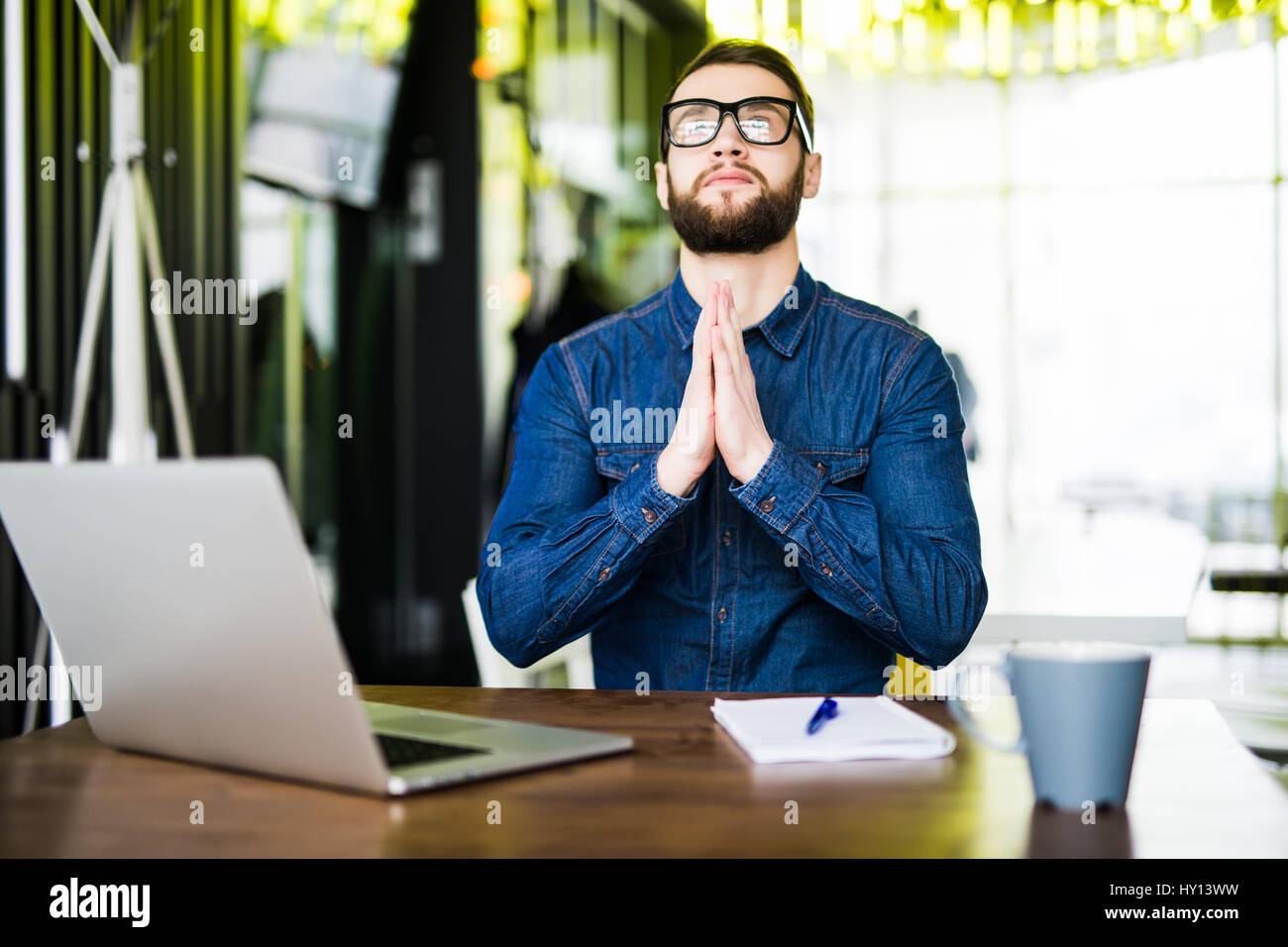 Praying for success hi-res stock photography and images - Alamy